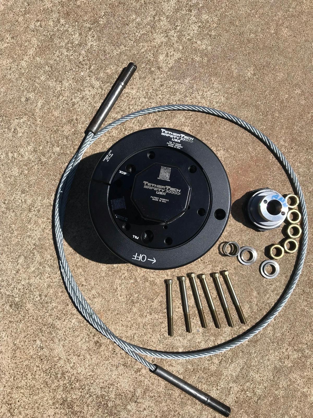 Tethering device puts end to wheel-off accidents, inventor says ...